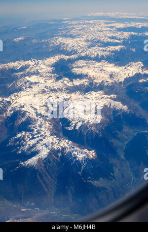 Air view of the snow-capped Pyrenees mountains in Andora, a small ...