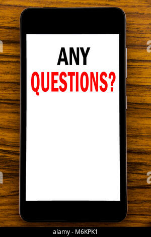 Handwriting Announcement text showing Any Questions. Business concept ...