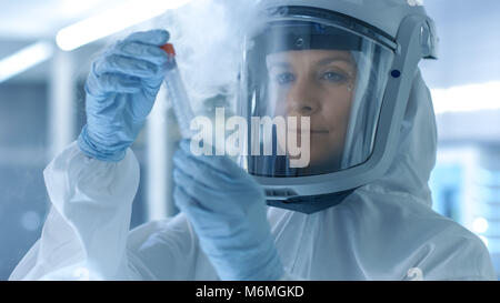 Medical Virology Research Scientist Works in a Hazmat Suit with Mask ...
