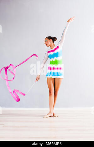 Professional gymnast woman dancer with ribbon Stock Photo - Alamy