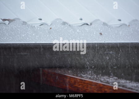 Pouring rain hitting tin roof , Finland Stock Photo - Alamy