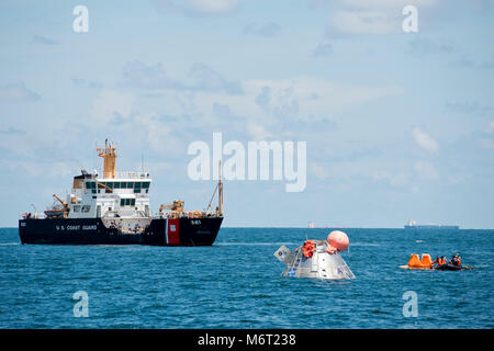 Astronaut and retired Coast Guard Capt. Dan Burbank joined three other ...