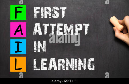 FAIL first attempt in learning symbol. Wooden blocks with words FAIL ...