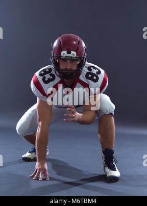 American football player getting ready before starting Stock Photo - Alamy