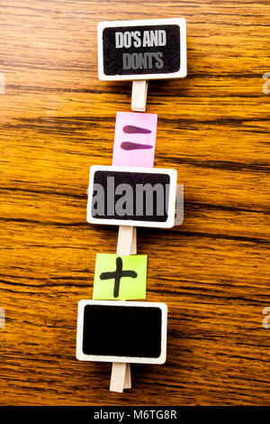 Text sign showing Do's And Don Ts. Business concept Confusion in one's ...