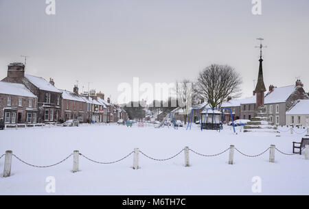 Norham village green, looking towards the Castle Stock Photo - Alamy