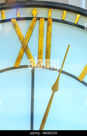 Clock showing 12 o'clock, white background Stock Photo - Alamy
