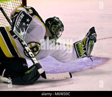 BYRON DAFOE MAKES A SAVE IN SECOND PERIOD ACTION AGAINST THE SENATORS ...