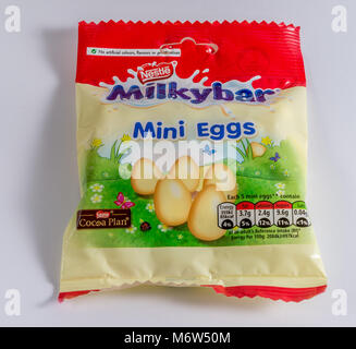 Packet of Nestle Milky bar mini eggs isolated on white background ...