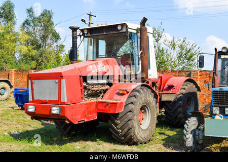 Big yellow tractor. Old Soviet agricultural machinery Stock Photo - Alamy
