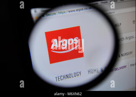 The Argos website is seen through a magnifying glass Stock Photo - Alamy