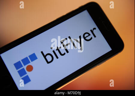 The BitFlyer logo on a phone screen Stock Photo - Alamy