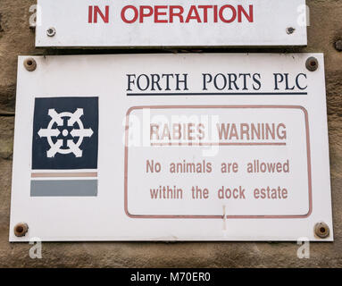 Rabies warning sign on harbour building Arbroath, Angus, Scotland Stock ...