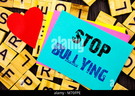 Handwritten text sign showing Stop Bullying. Business concept for ...