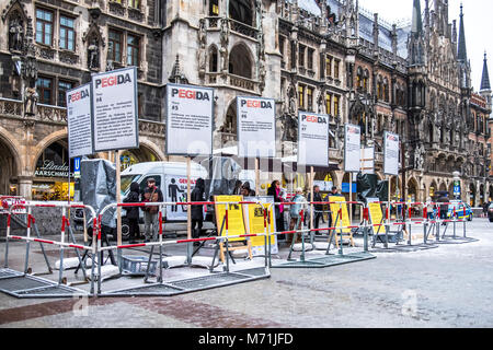 MUNICH / GERMANY - FEBRUARY 15 2018 :Man photographing the townhall ...