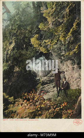 A photograph of the Fairy Arch, a natural geological formation. The ...
