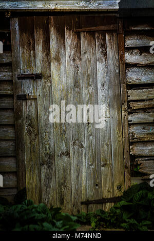 Rustic wooden cabin door lock and handle with rusted hinges Stock Photo ...