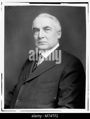 This image captures President Warren G. Harding participating in a golf ...
