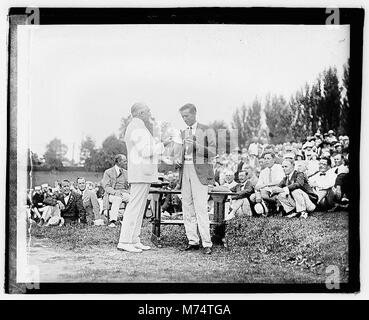 A photograph of President Warren G. Harding with golfer Jim Barnes on ...