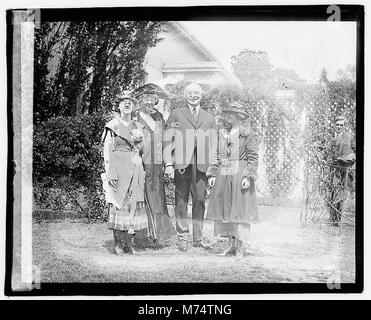 The image features a group portrait of the Harding Cabinet, the ...