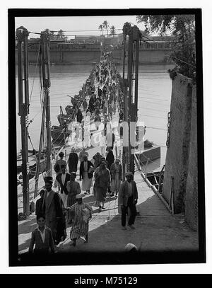 This image shows the Tigris River in Baghdad, Iraq, with a view of the ...