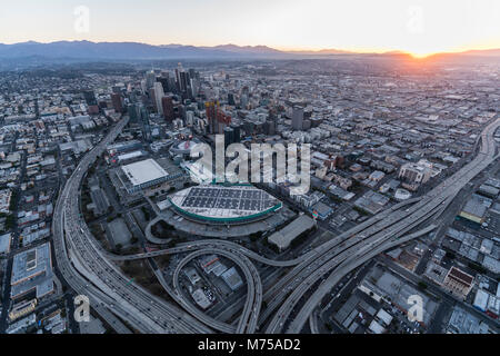 Aerial sunrise view of 10 and 110 freeway interchange ramps in downtown ...