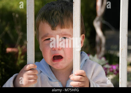 little cute boy screaming and crying at school Stock Photo: 84457574 ...