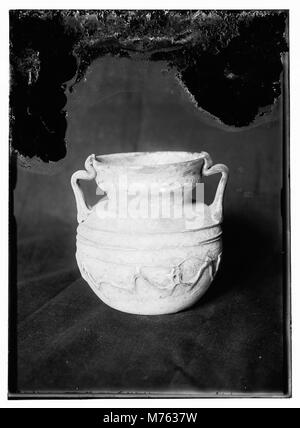 A photograph of antique glass, showcasing its intricate design and ...