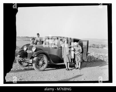 Mrs. Pyle & Mrs. Matson inside new Dodge in countryside Stock Photo - Alamy