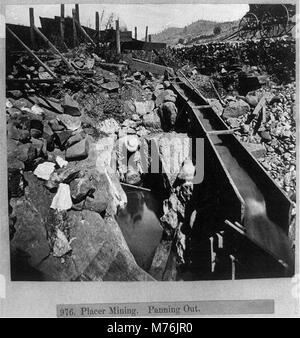 The image captures placer mining using a flume in Brown's Flat ...