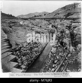This photograph depicts placer mining in Columbia Gulch, Tuolumne ...