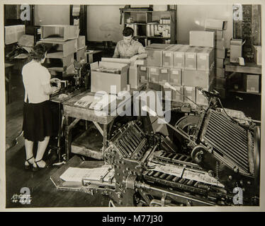 A photo showcasing the book manufacturing process using sheet-fed ...