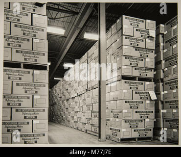 A photo depicting the process of book manufacturing, focusing on the ...