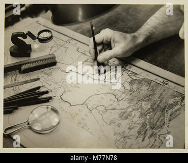 This image depicts the production procedures in cartographic publishing ...