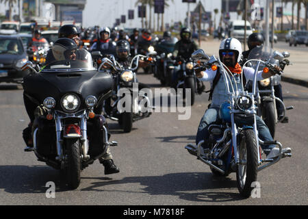Cairo, Egypt. 09th Mar, 2018. Bikers pose for a picture during a women ...