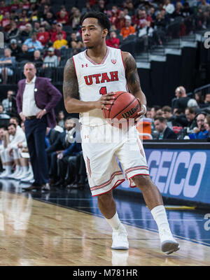 Utah guard Justin Bibbins (1) drives to the basket as Western Kentucky ...