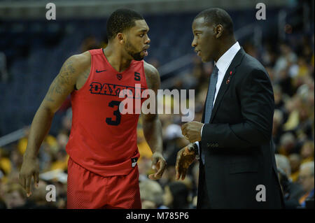 Dayton coach Anthony Grant talks with Enoch Cheeks (6) during the ...