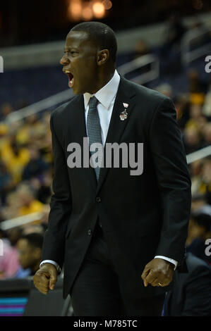 Dayton head coach Anthony Grant, right, speaks with an official during ...
