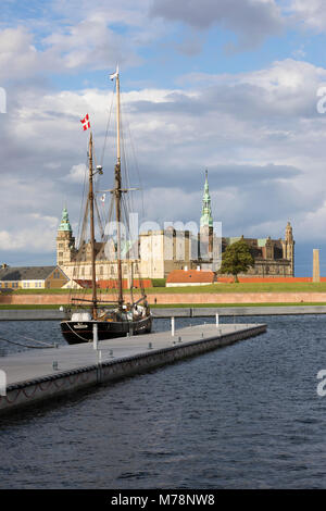 Tall ship in harbour with Kronborg Castle used as setting for ...