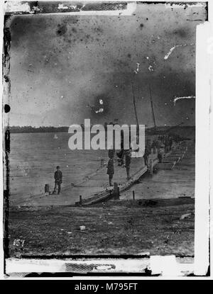 Soldiers crossing a pontoon bridge in Chateau Thierry during World War ...