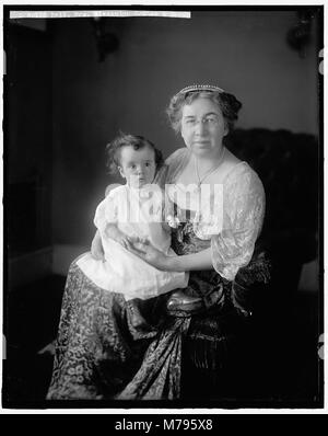A photograph of Mrs. Alexander Graham Bell with their child, capturing ...