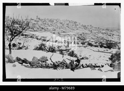 A snow-covered view of Bethlehem, showing the Church of the Nativity, a ...