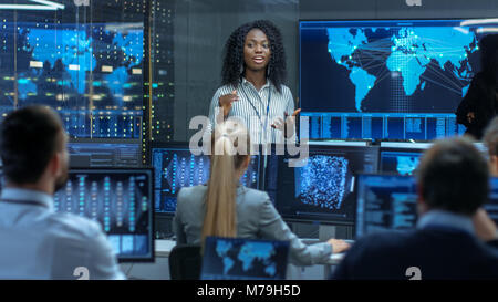 Chief Project Engineer Holds Briefing for a Team of Scientists that are ...