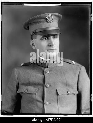 General Cole, a military figure during World War I, enters his car near ...