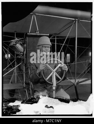 A historical portrait of an aviator, likely from the early 20th century ...