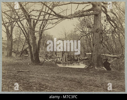 A photograph of the ruins of a railroad bridge at Blackburn's Ford ...