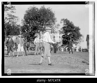 A photograph of President Warren G. Harding participating in the ...