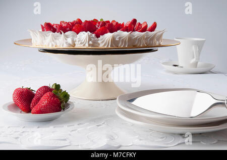 Delicious Dessert With Meringue Topping and Coffee on a Wooden Table ...