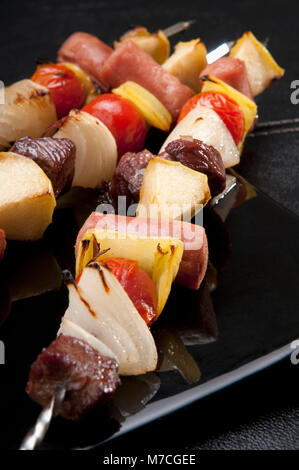 Skewered appetizer, studio shot Stock Photo - Alamy