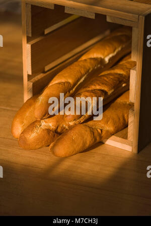 Fresh baked bread in crate in bakery Stock Photo - Alamy